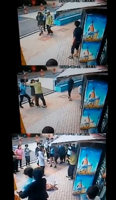 부산 묻지마 폭행 CCTV 공개…"취객 남성, 여성 머리채 잡고" - SBS Biz